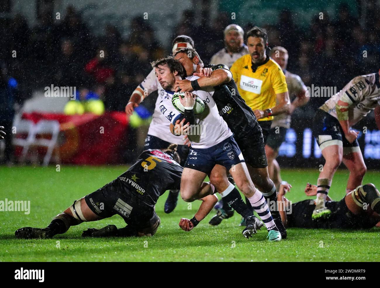 Dragons RFC's Rhodri Williams is tackled by Hollywoodbets Sharks ...