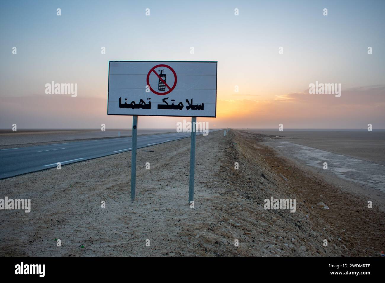 Road sign No Signal in Arabic Language. Beautiful colourful sunset over ...