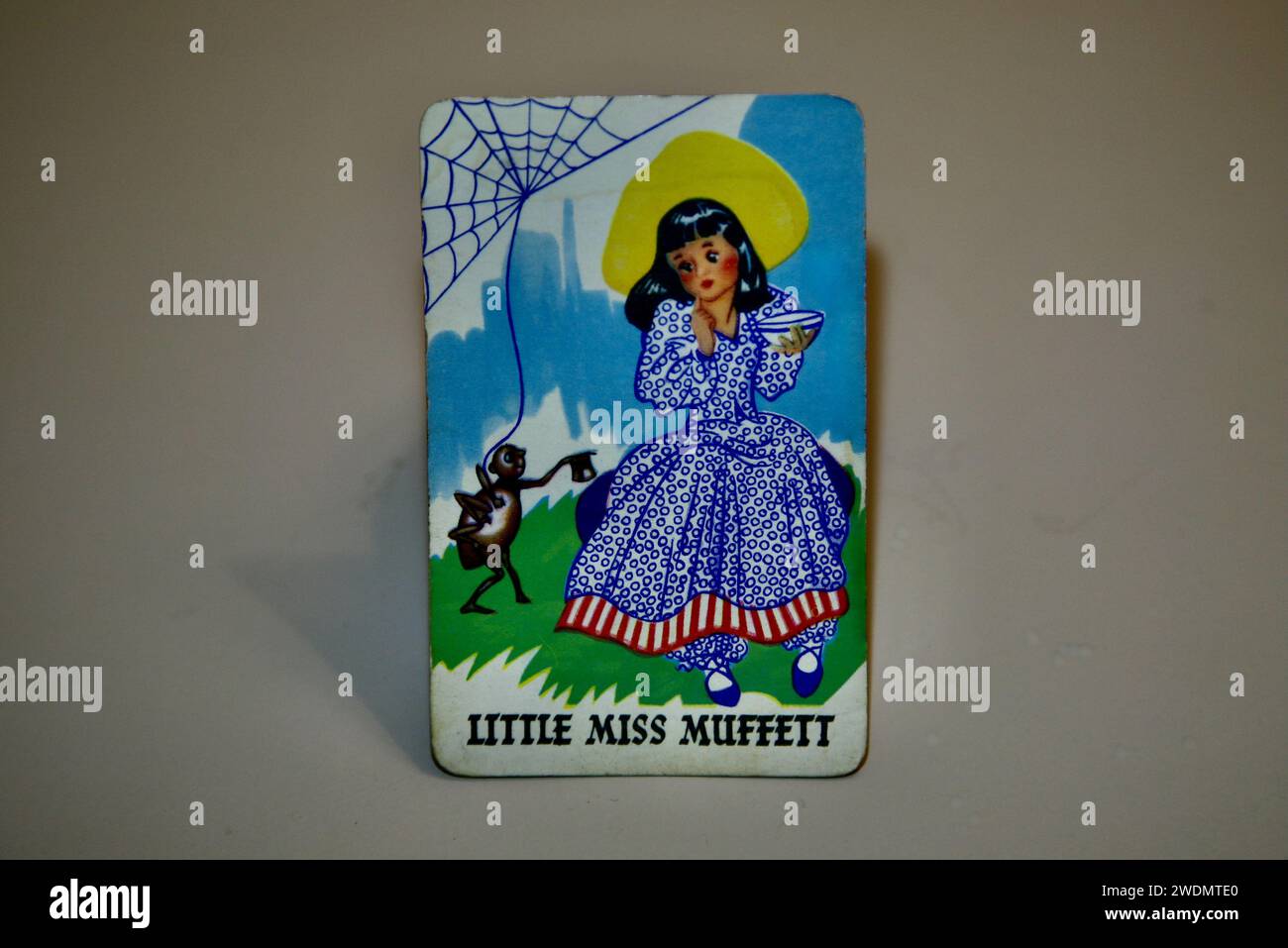 Little Miss Muffet and a big hairy spider Stock Photo - Alamy