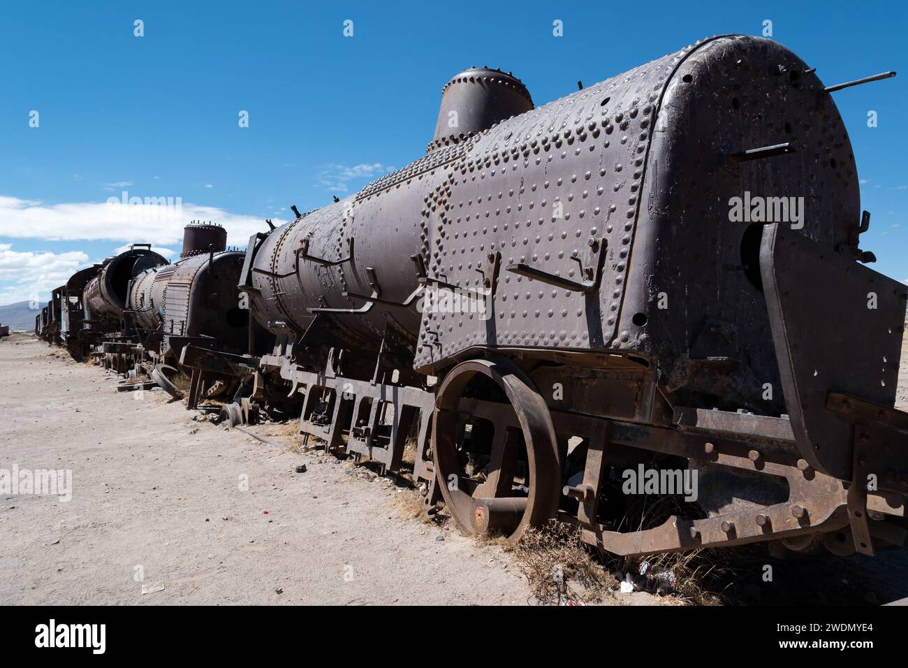 ancient train in uyuni, bolivia Stock Photo - Alamy