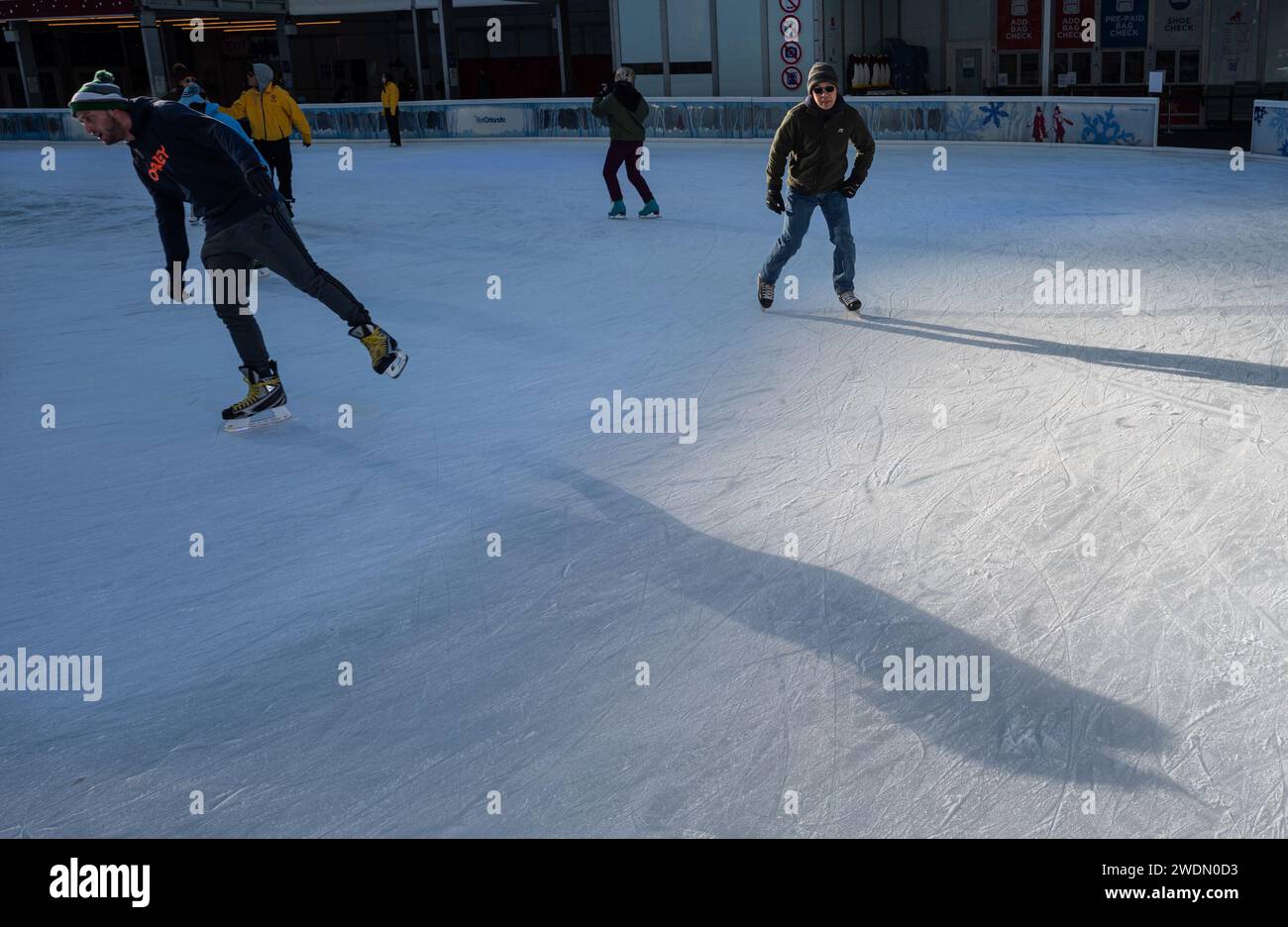 New York, New York, USA. 21st Jan, 2024. Ice skaters take a spin around ...