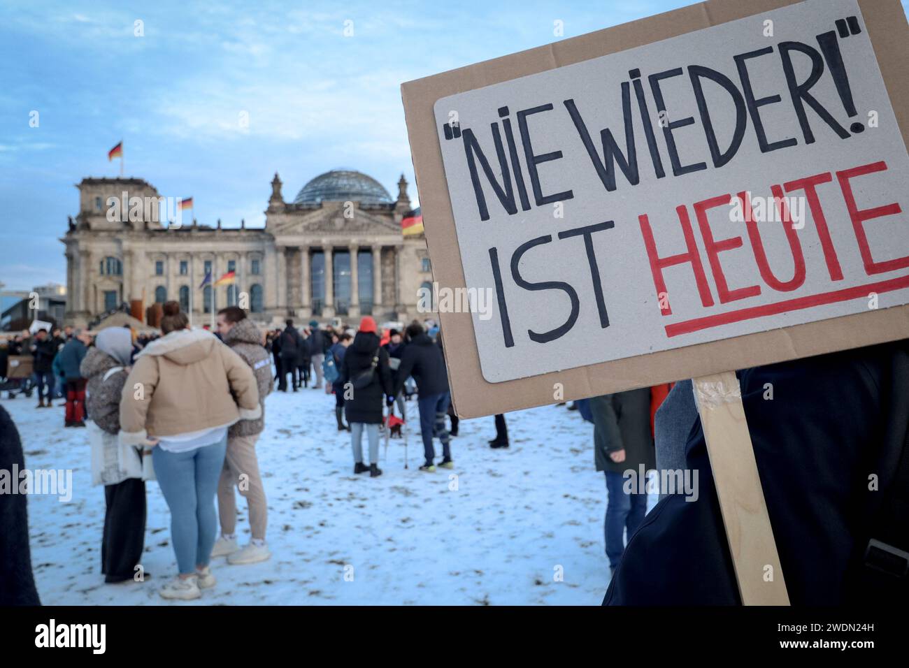 Berlin, Germany - January 21, 2024: Protestor is holding a sign reading ...