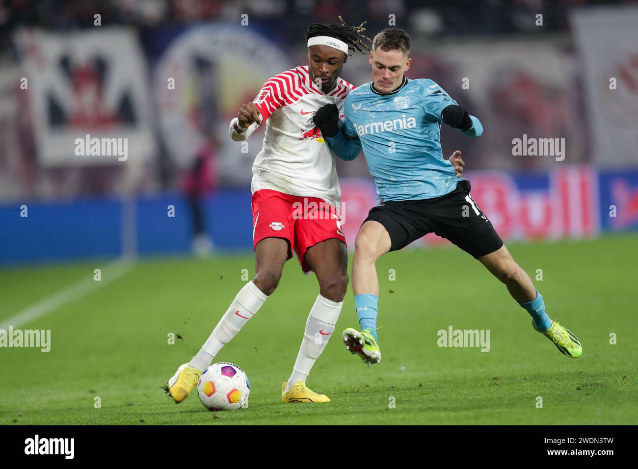 Leipzig, Germany. 20th Jan, 2024. Mohamed Simakan of RB Leipzig (L) and ...