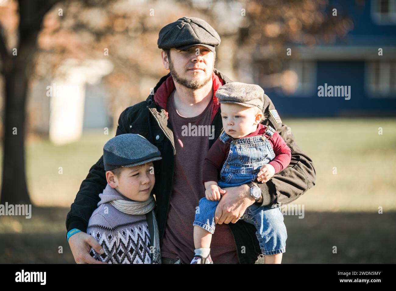 Fathers Day. Brothers and their dad enjoying time together in nature ...