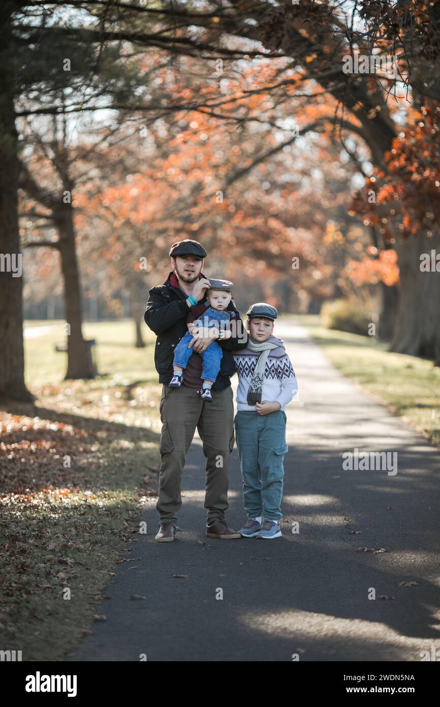 Fathers Day. Brothers and their dad enjoying time together in nature ...