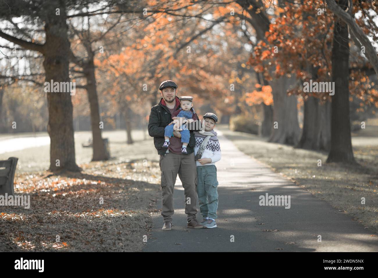 Fathers Day. Brothers and their dad enjoying time together in nature ...