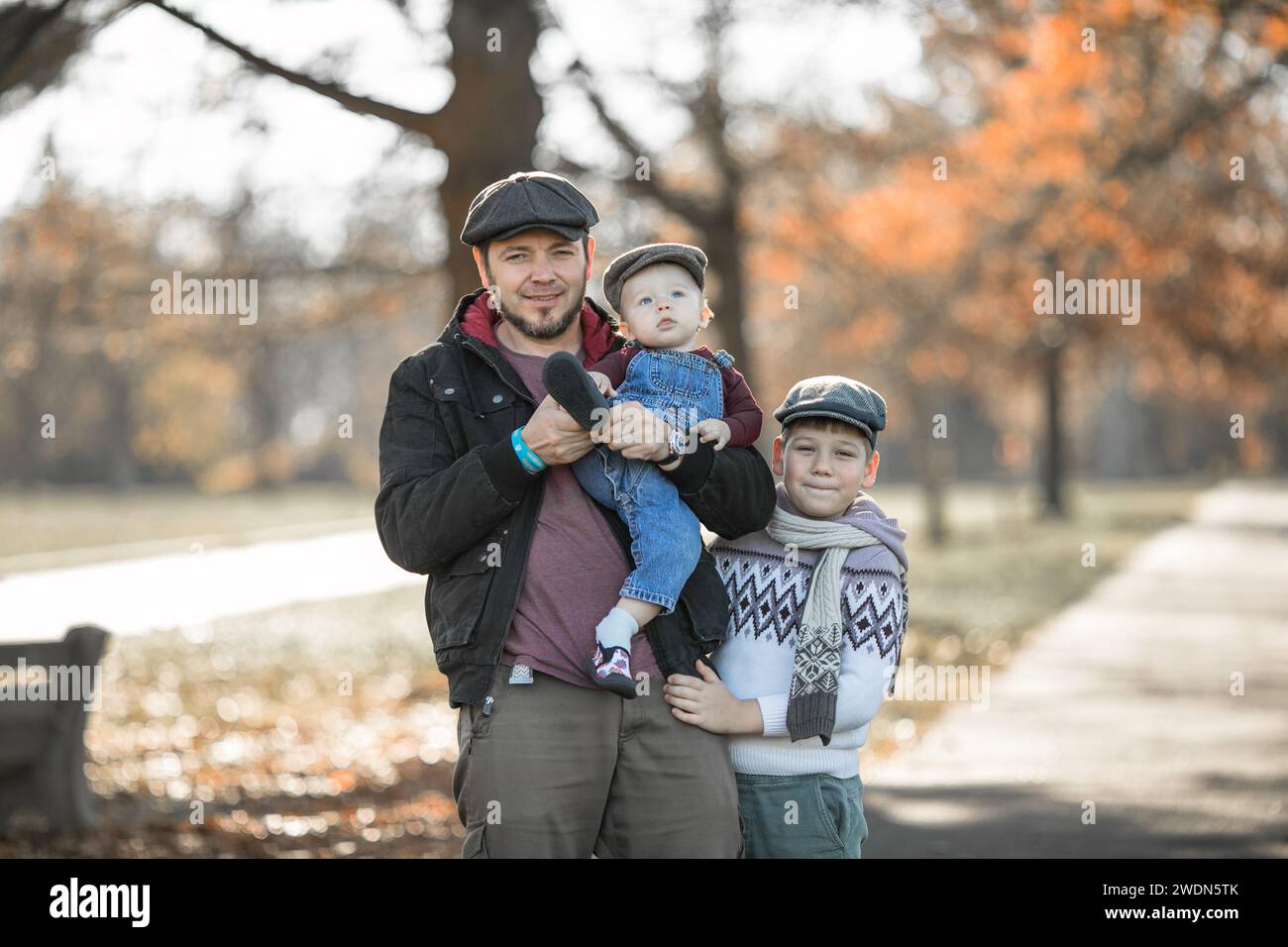 Fathers Day. Brothers and their dad enjoying time together in nature ...