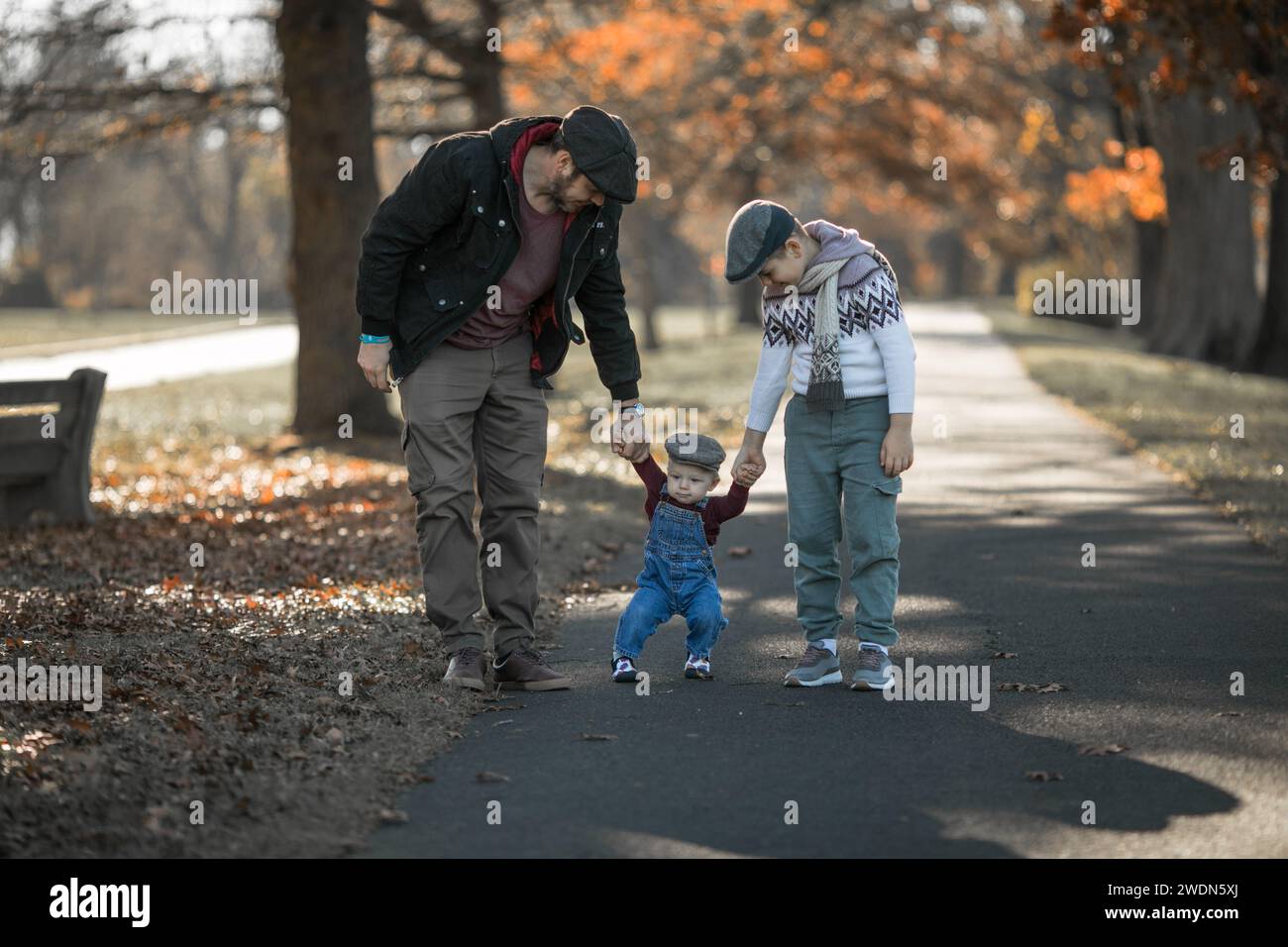 Fathers Day. Brothers and their dad enjoying time together in nature ...