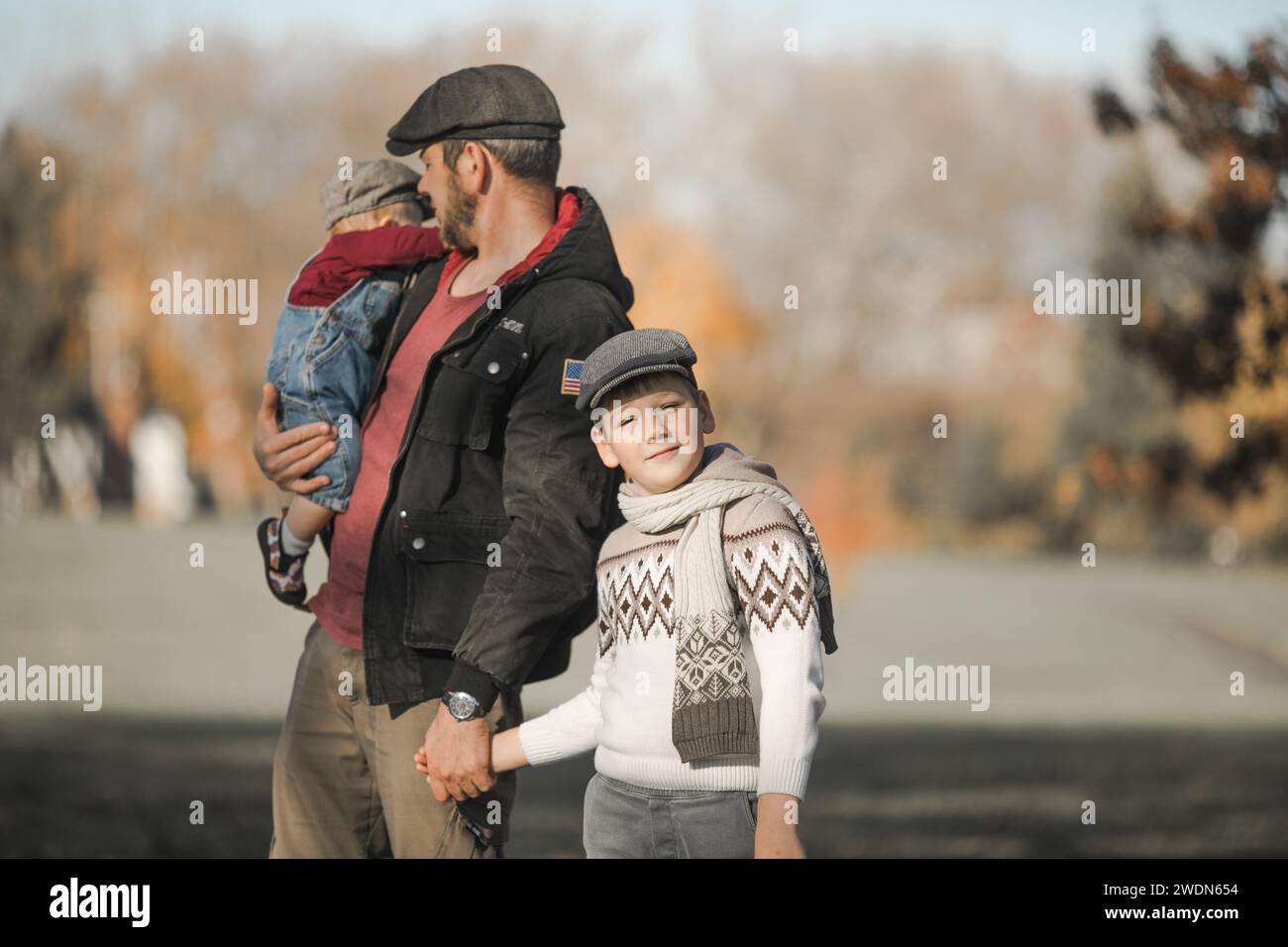 Fathers Day. Brothers and their dad enjoying time together in nature ...