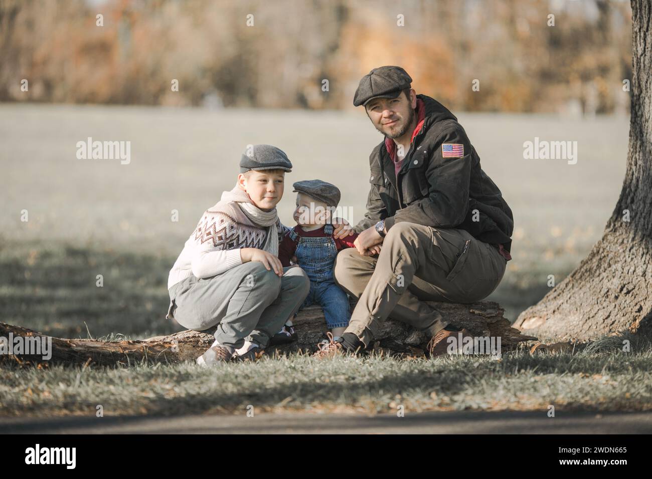 Fathers Day. Brothers and their dad enjoying time together in nature ...