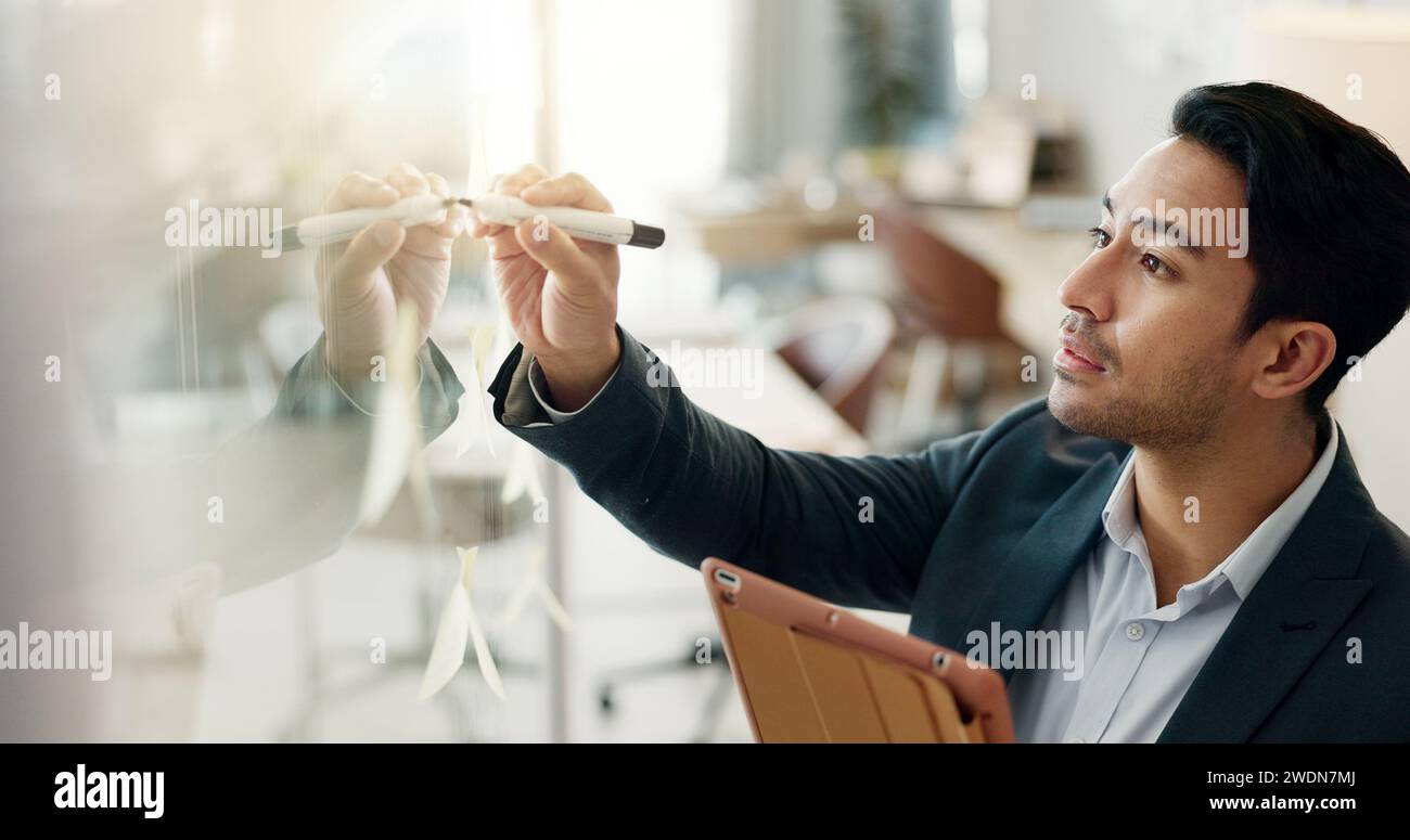 Writing, business man and tablet planning on clear board with thinking, problem solving and work ...