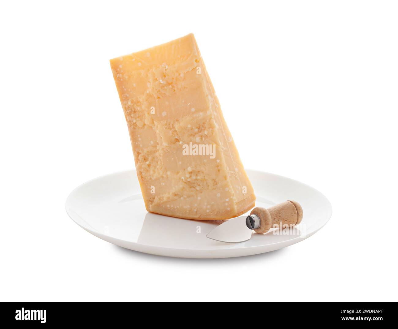 Aged parmesan cheese or parmigiano reggiano and a knife with a wooden ...