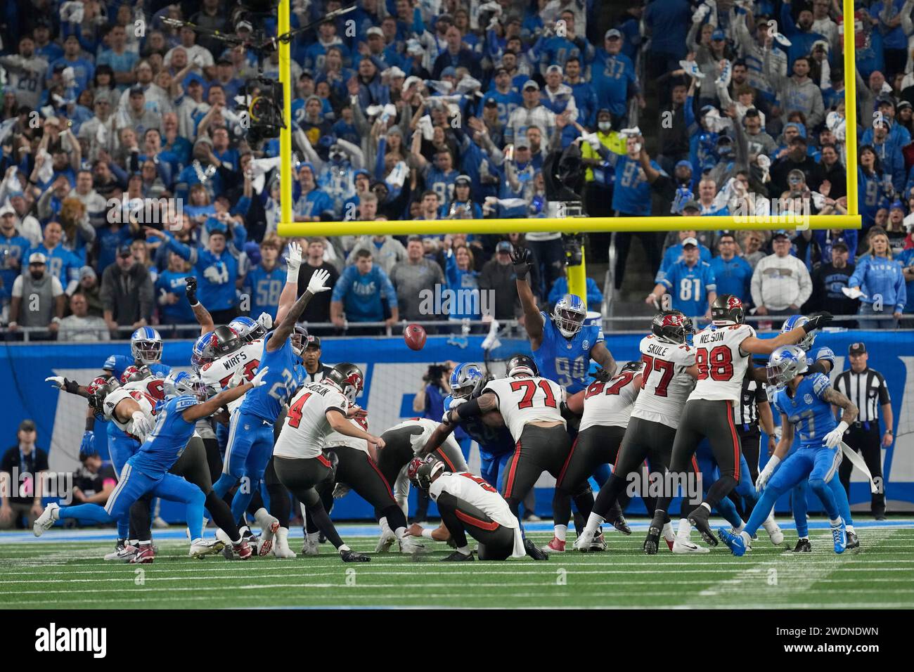 Tampa Bay Buccaneers kicker Chase McLaughlin (4), with Jake Camarda (5) holding, kicks an extra ...