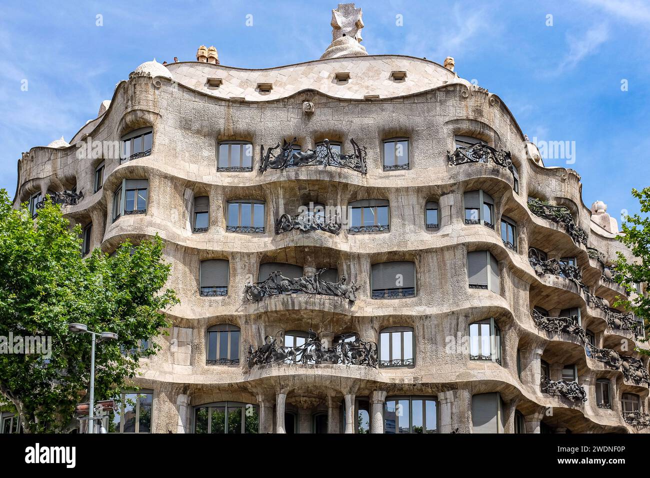 Casa Milà or La Pedrera is a famous building in Barcelona designed by ...