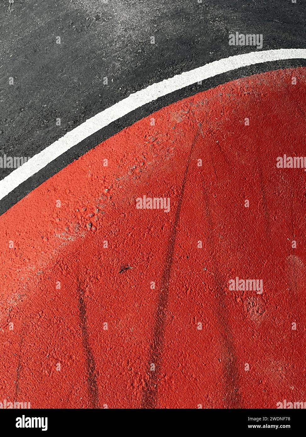 Pumptrack vibrance: White lines and red accents adorn the asphalt ...