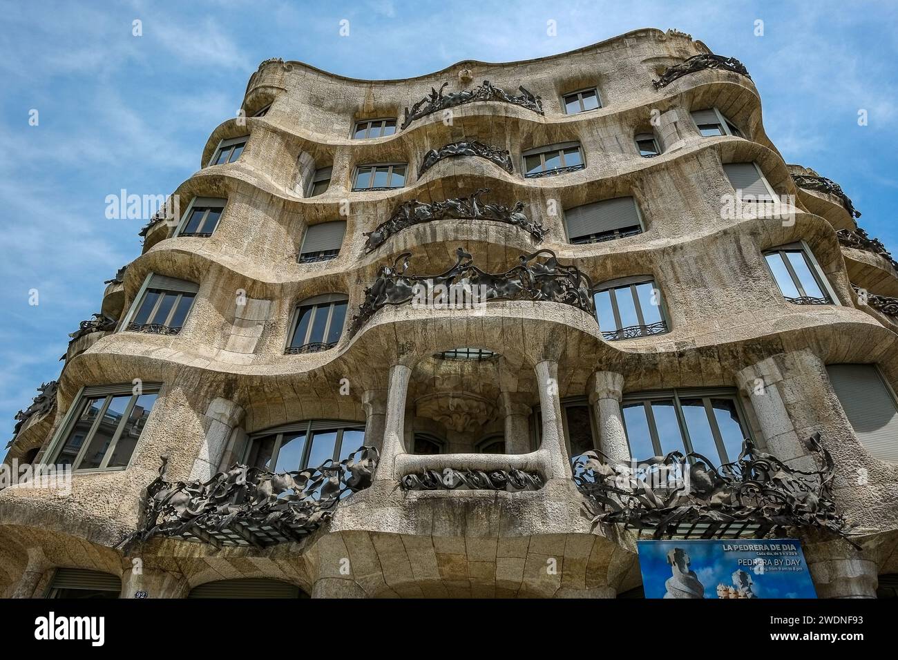 Casa Milà or La Pedrera is a famous building in Barcelona designed by ...