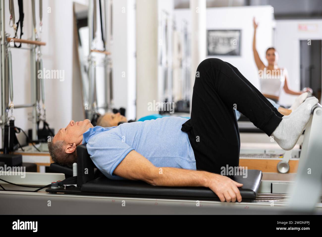 Man lying down legs up exercise hi-res stock photography and images - Alamy