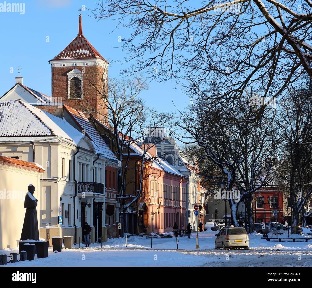 The late afternoon view of Kaunas Town Hall Square houses and a spire ...