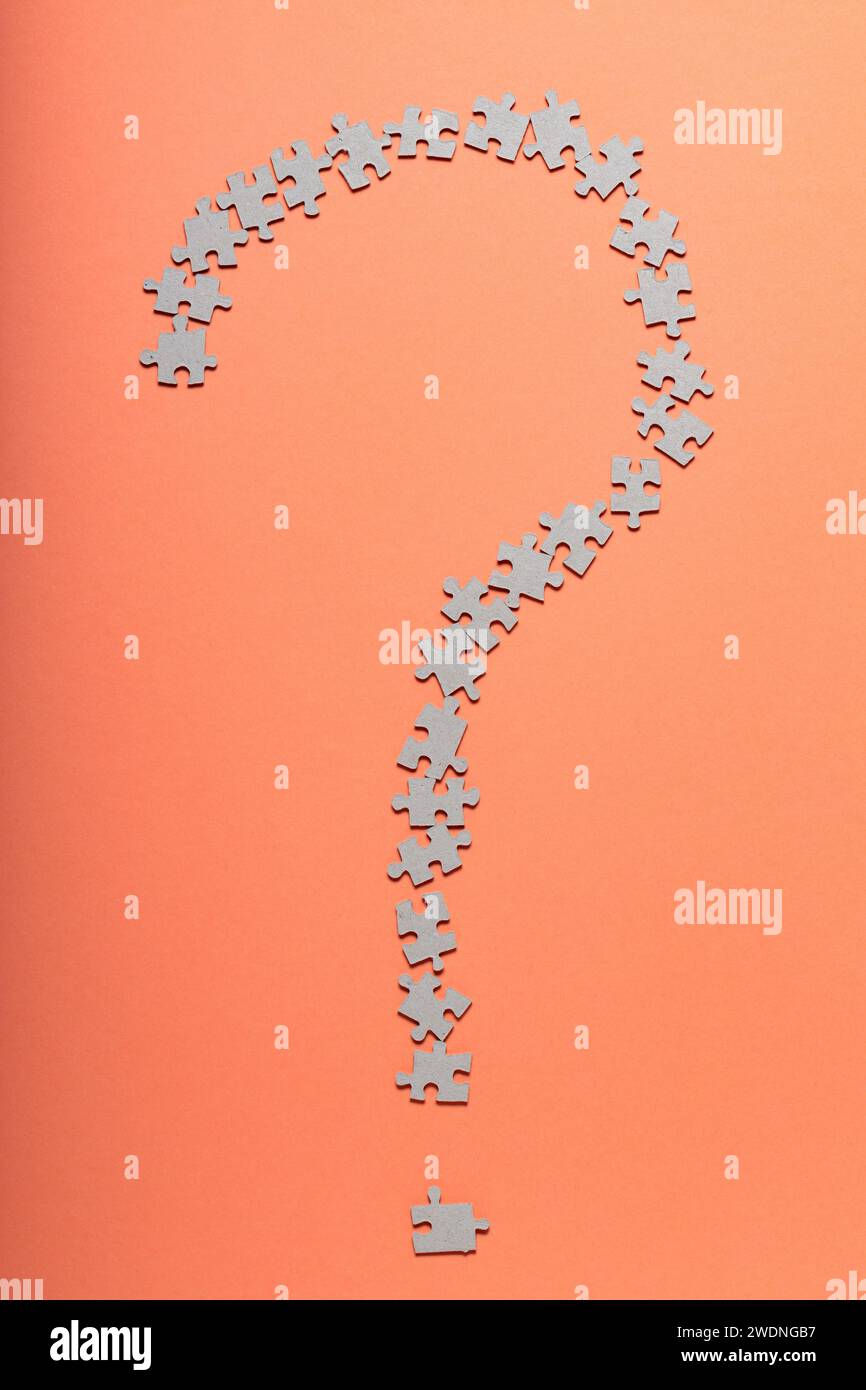 Question Mark Made of Puzzle Pieces on an Orange Background, Concept of Curiosity and Riddles ...