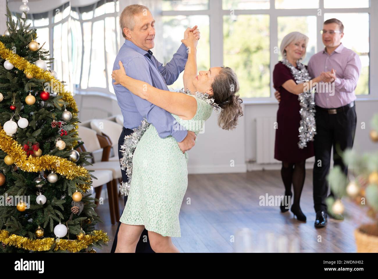 Elderly man and elderly woman dance waltz Stock Photo - Alamy