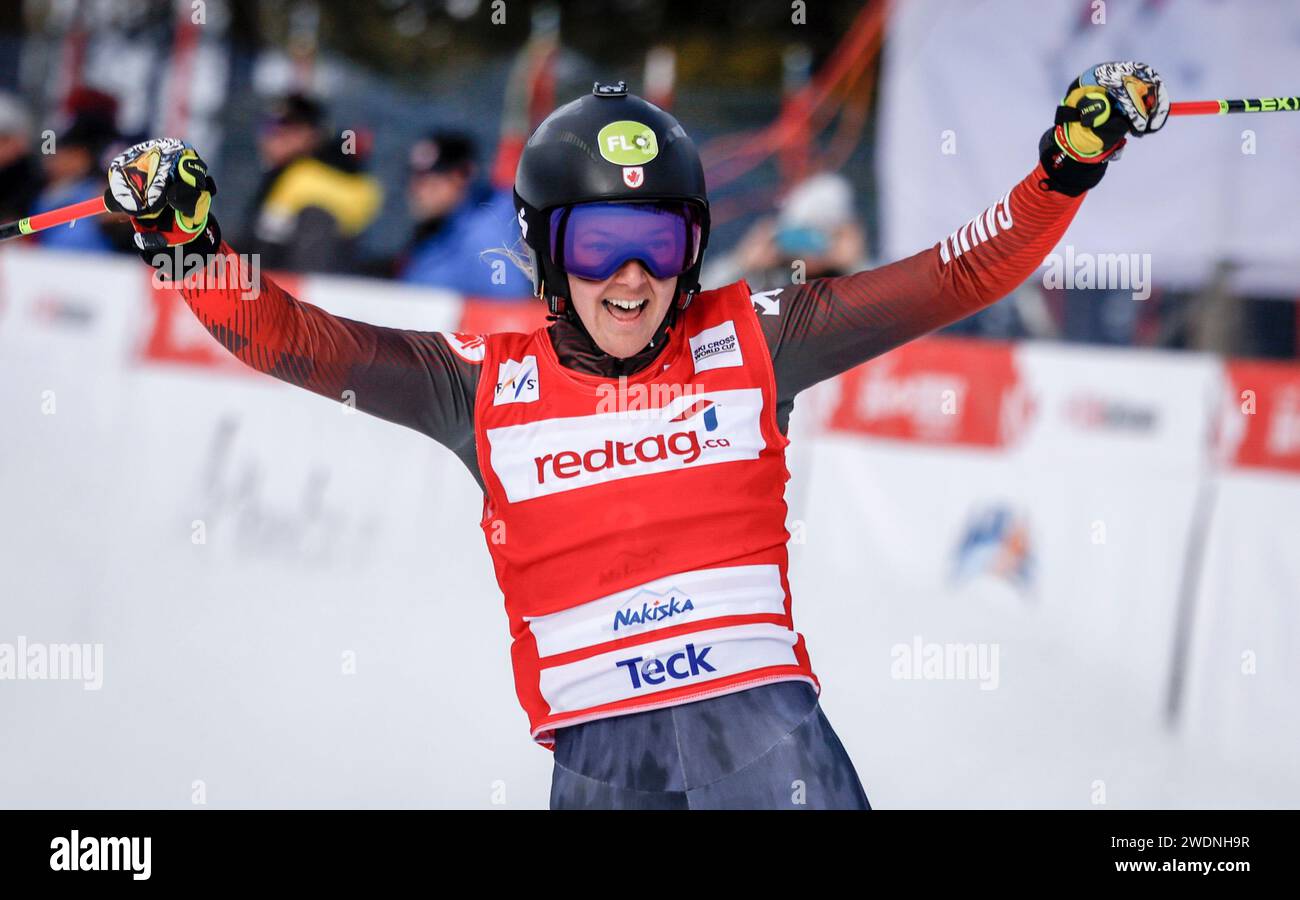 Canada's Hannah Schmidt, left, celebrates after her win as she crosses ...