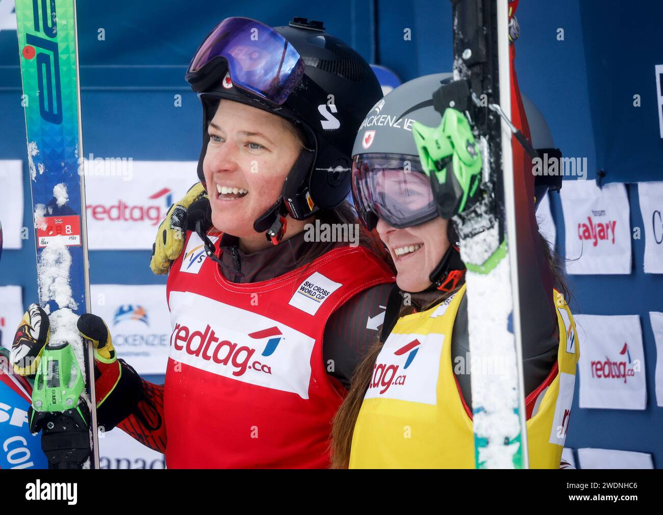 Canada's Hannah Schmidt, left, celebrates after her win with teammate ...