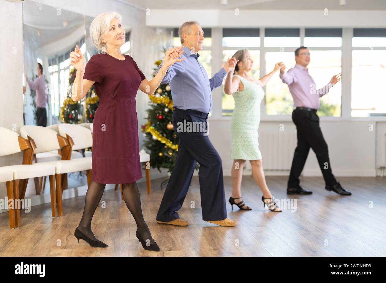 Group of men and women dancing folk dance Stock Photo - Alamy