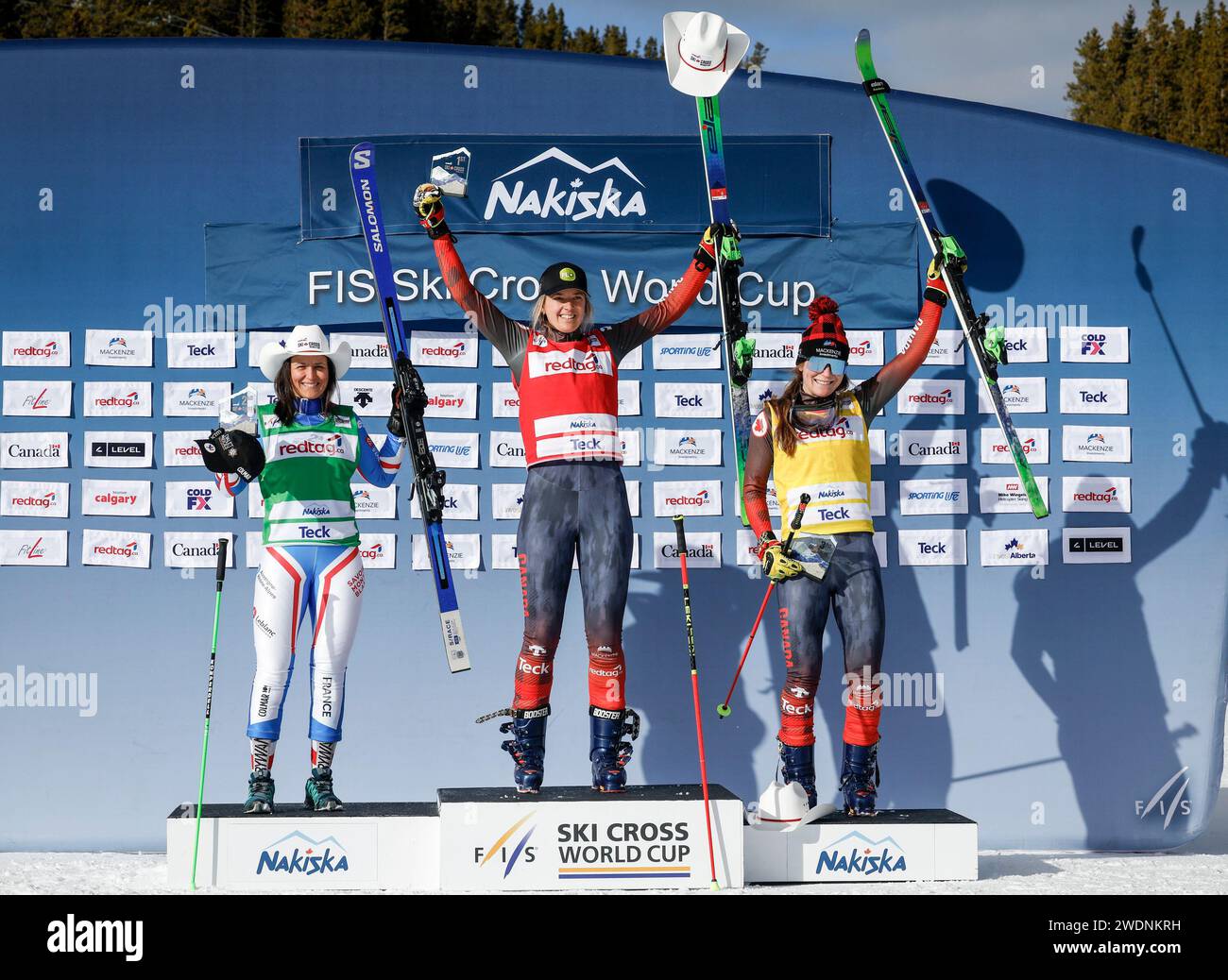 First-place finisher Hannah Schmidt, center, of Canada, celebrates on ...