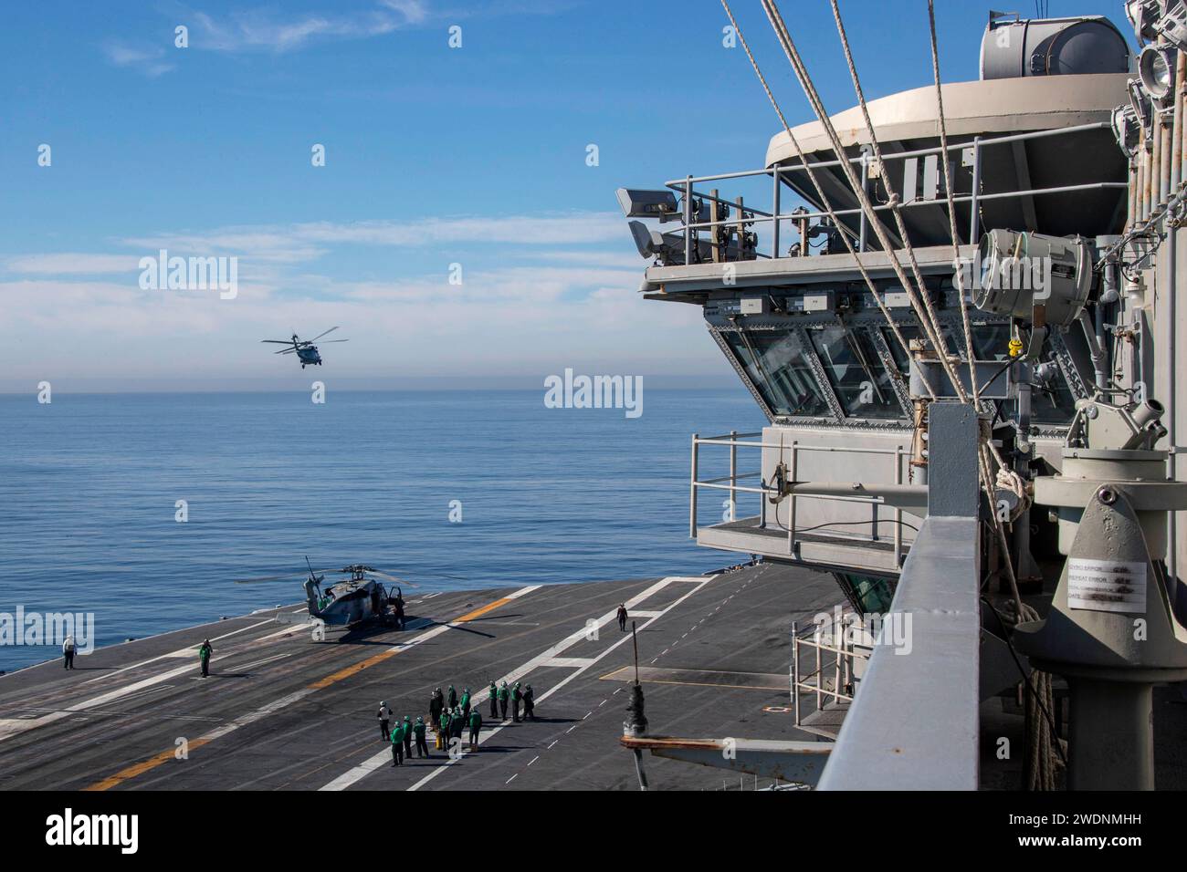 240118-N-ED228-1015 PACIFIC OCEAN (Jan. 18, 2024) An MH-60S Sea Hawk ...