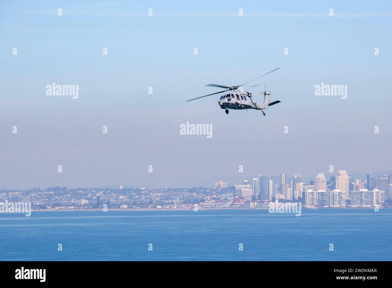 240118-N-ED228-1144 PACIFIC OCEAN (Jan. 18, 2024) An MH-60S Sea Hawk ...