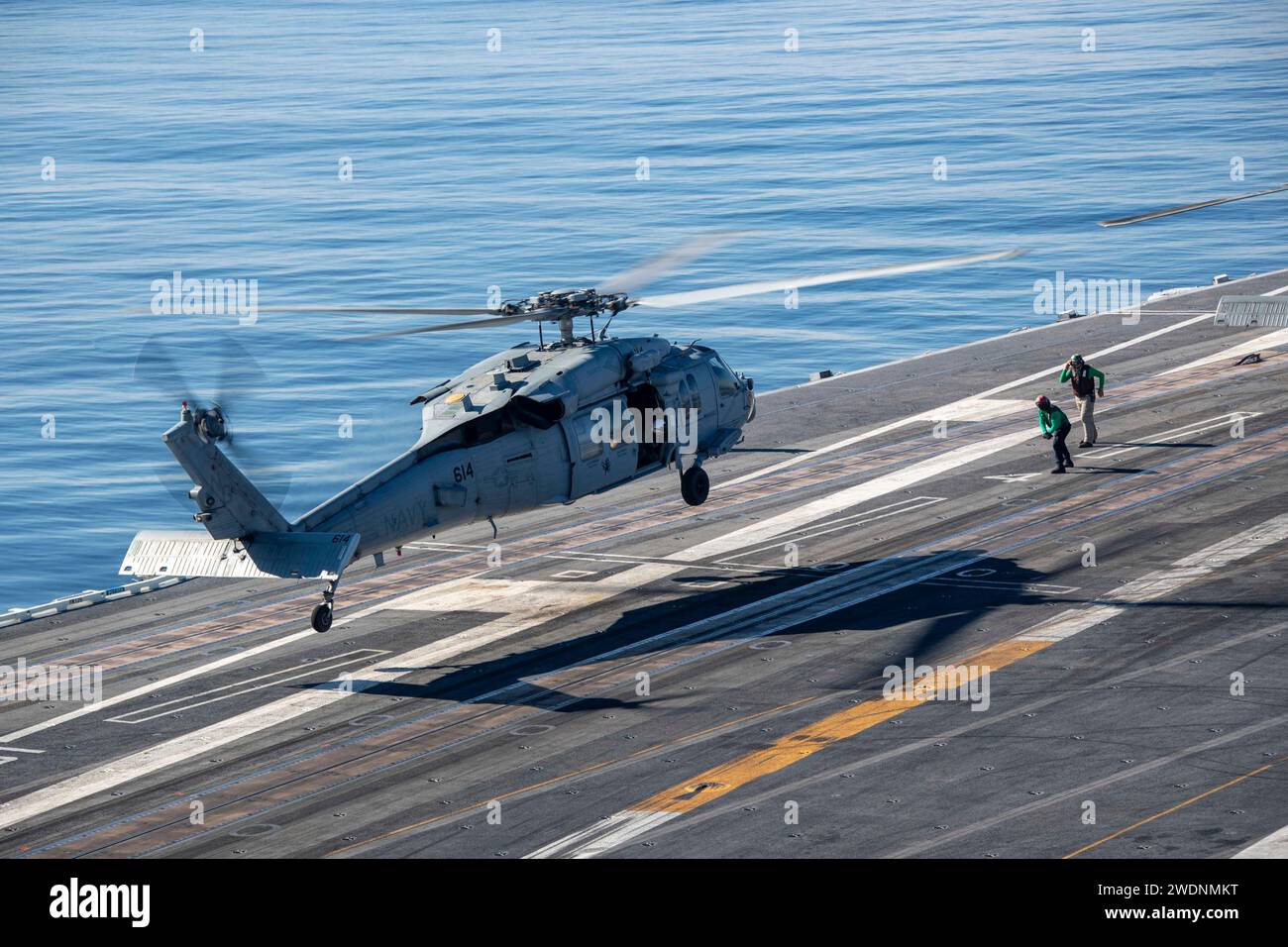 240118-N-ED228-1042 PACIFIC OCEAN (Jan. 18, 2024) An MH-60S Sea Hawk ...