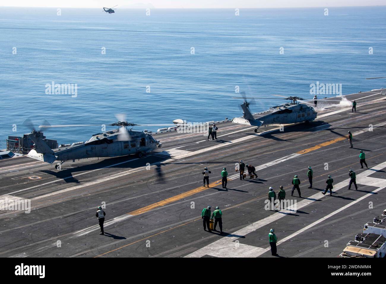 240118-N-ED228-1100 PACIFIC OCEAN (Jan. 18, 2024) Two MH-60S Sea Hawk ...