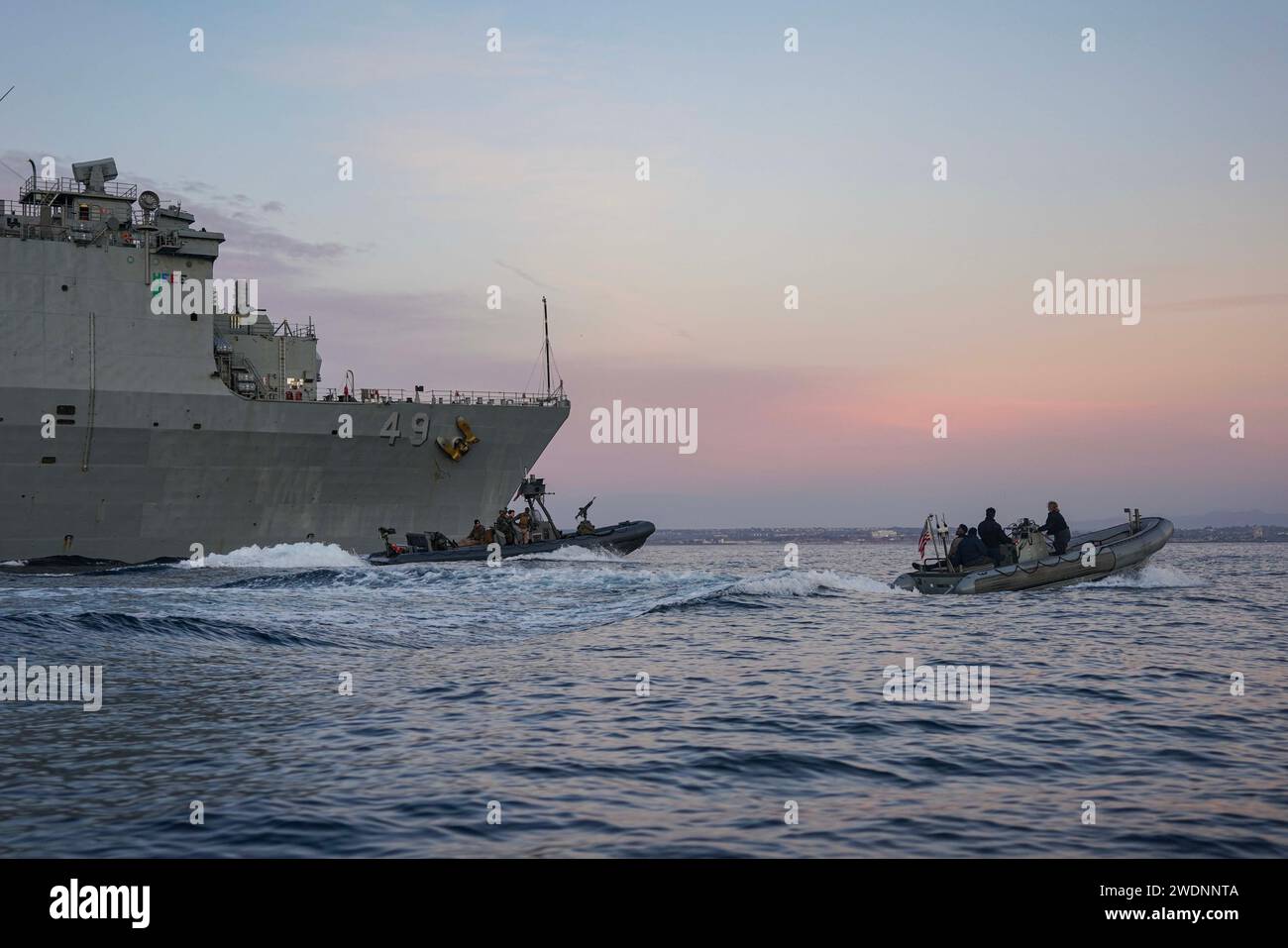 The amphibious dock landing ship USS Harpers Ferry (LSD 4), conducts ...