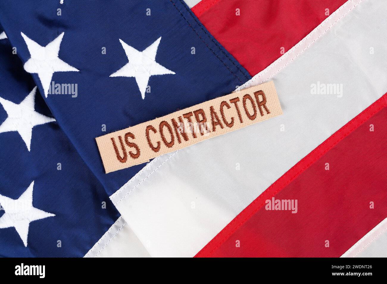 US Contractor Branch Tape on national USA flag background Stock Photo ...