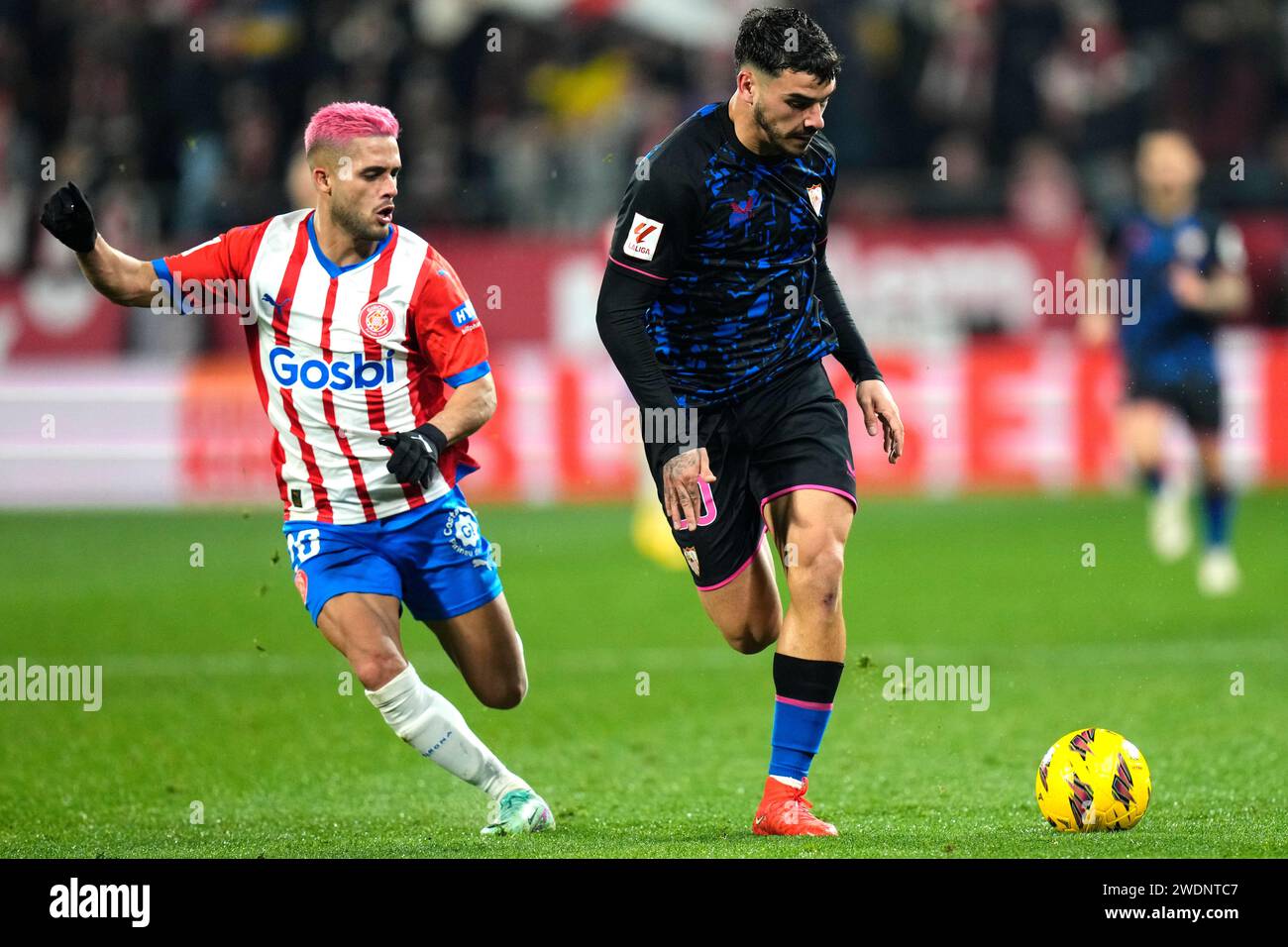 Girona, Spain. 21st Jan, 2024. Yan Couto (Girona FC) duels for the ball ...
