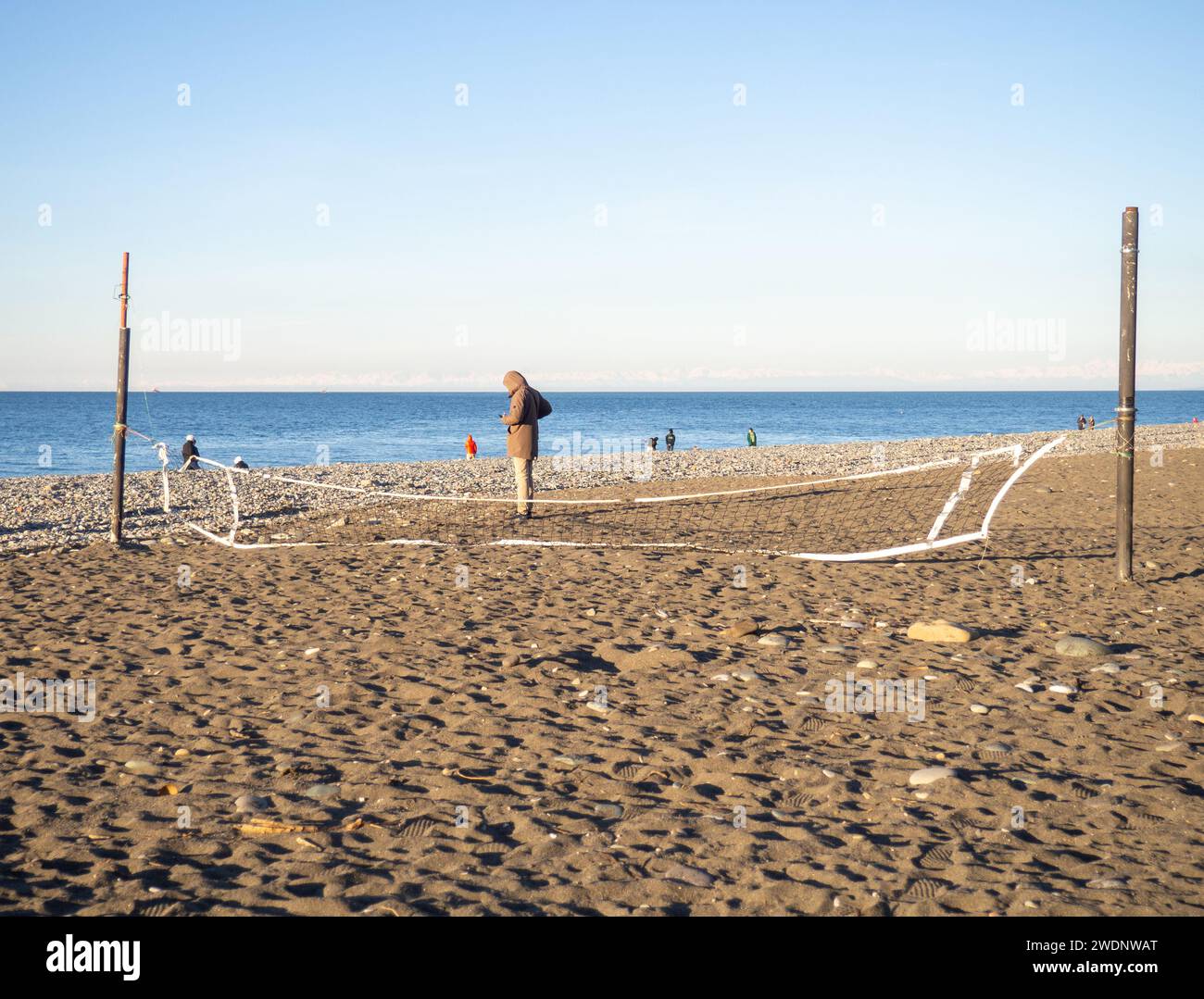Fallen volleyball net on the beach. The concept of winter at the Black ...