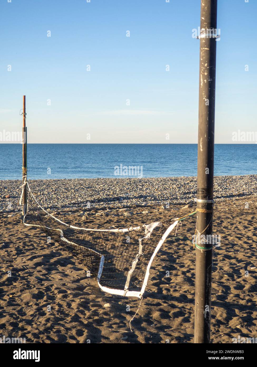 Fallen volleyball net on the beach. The concept of winter at the Black ...