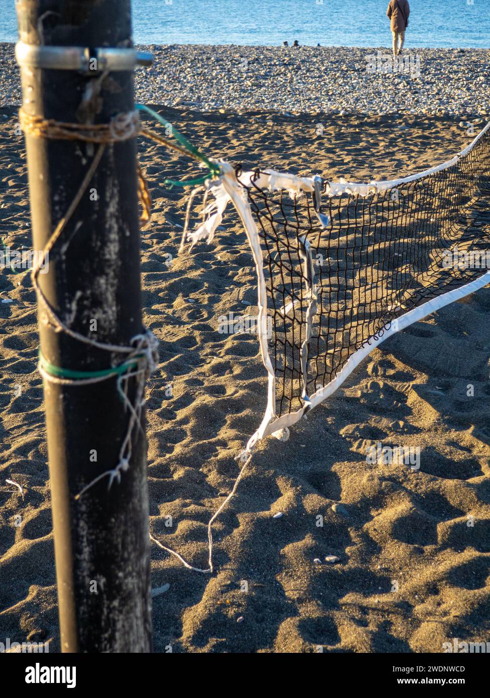 Fallen volleyball net on the beach. The concept of winter at the Black ...