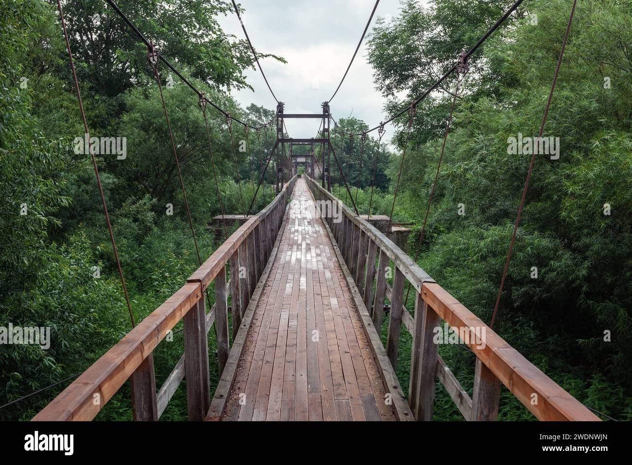 Wide angle, horizontal photography. Massive bridge hanging on metal ...