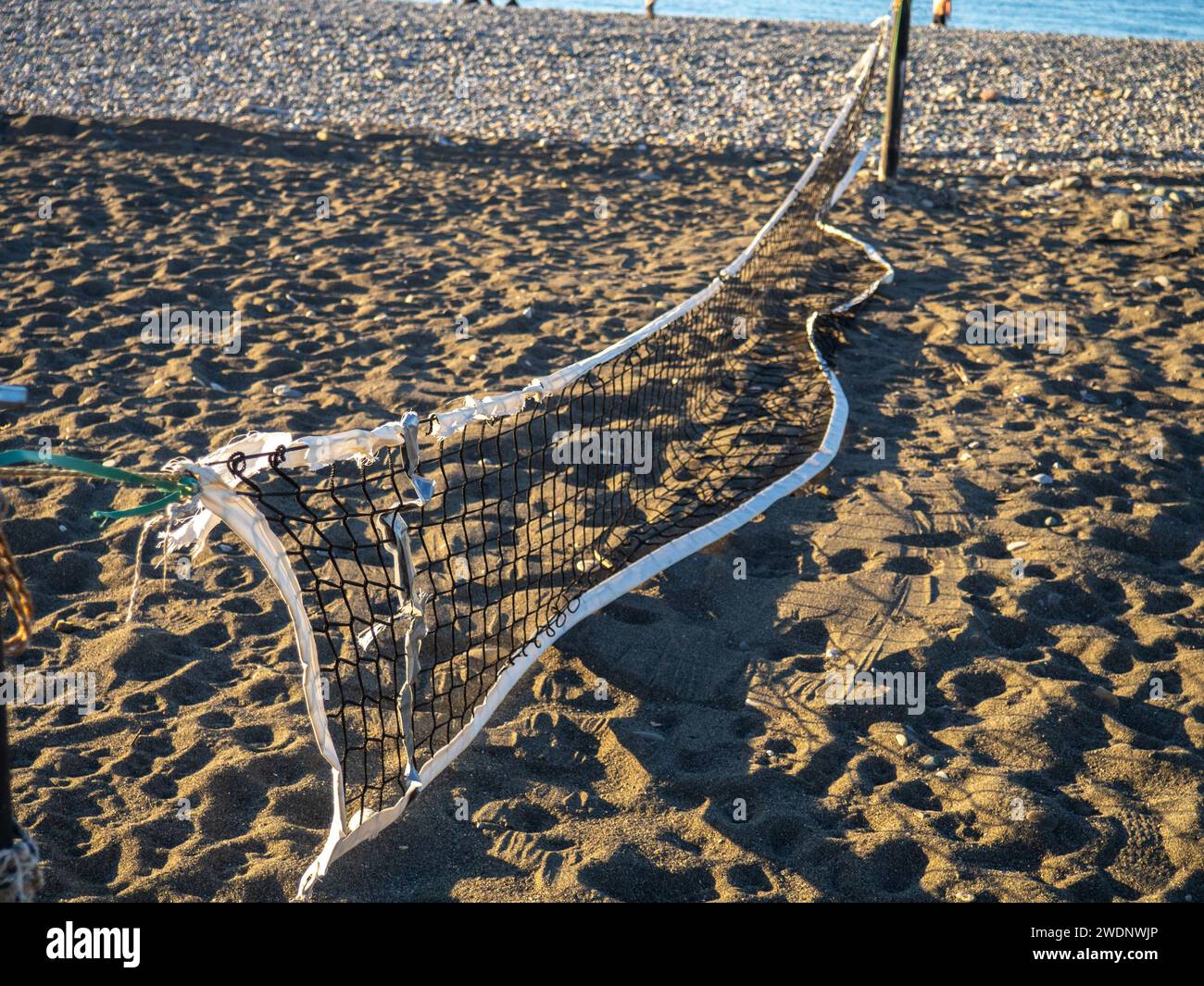 Fallen volleyball net on the beach. The concept of winter at the Black ...