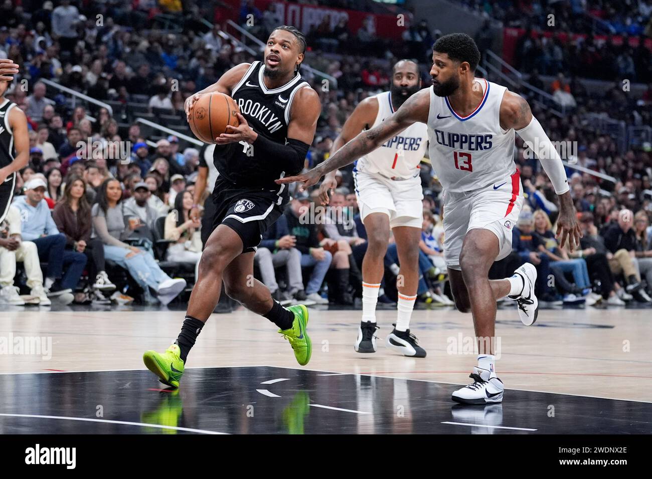 Brooklyn Nets guard Dennis Smith Jr. (4) dribbles past Los Angeles ...