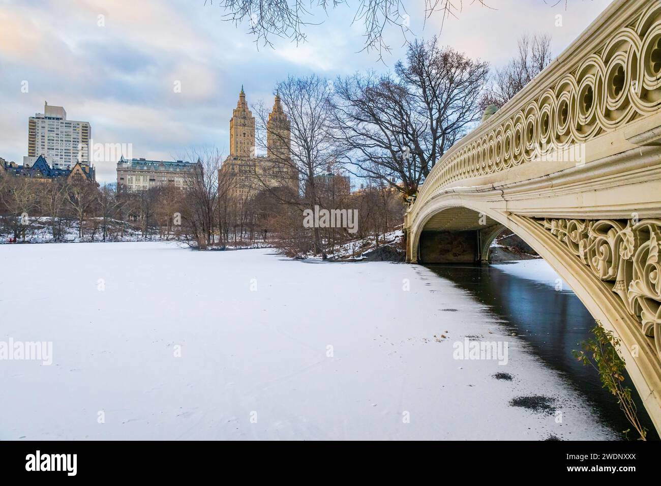 Panoramic view of New York Central Park Bow bridge ice lake and Upper ...