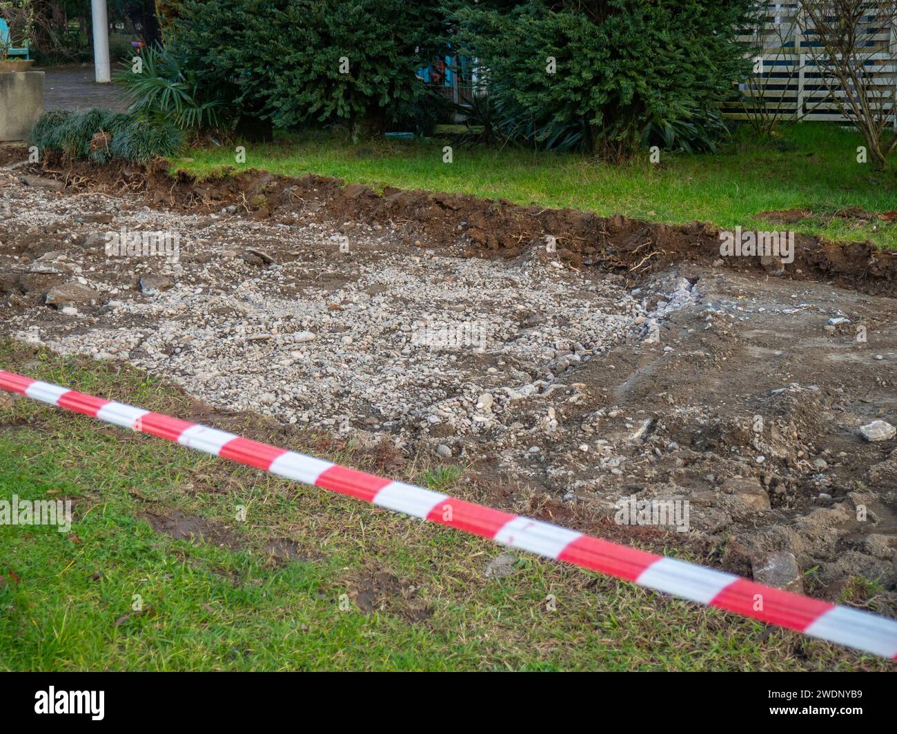 Reconstruction of the bike path. Replacing tiles on a bike path among ...