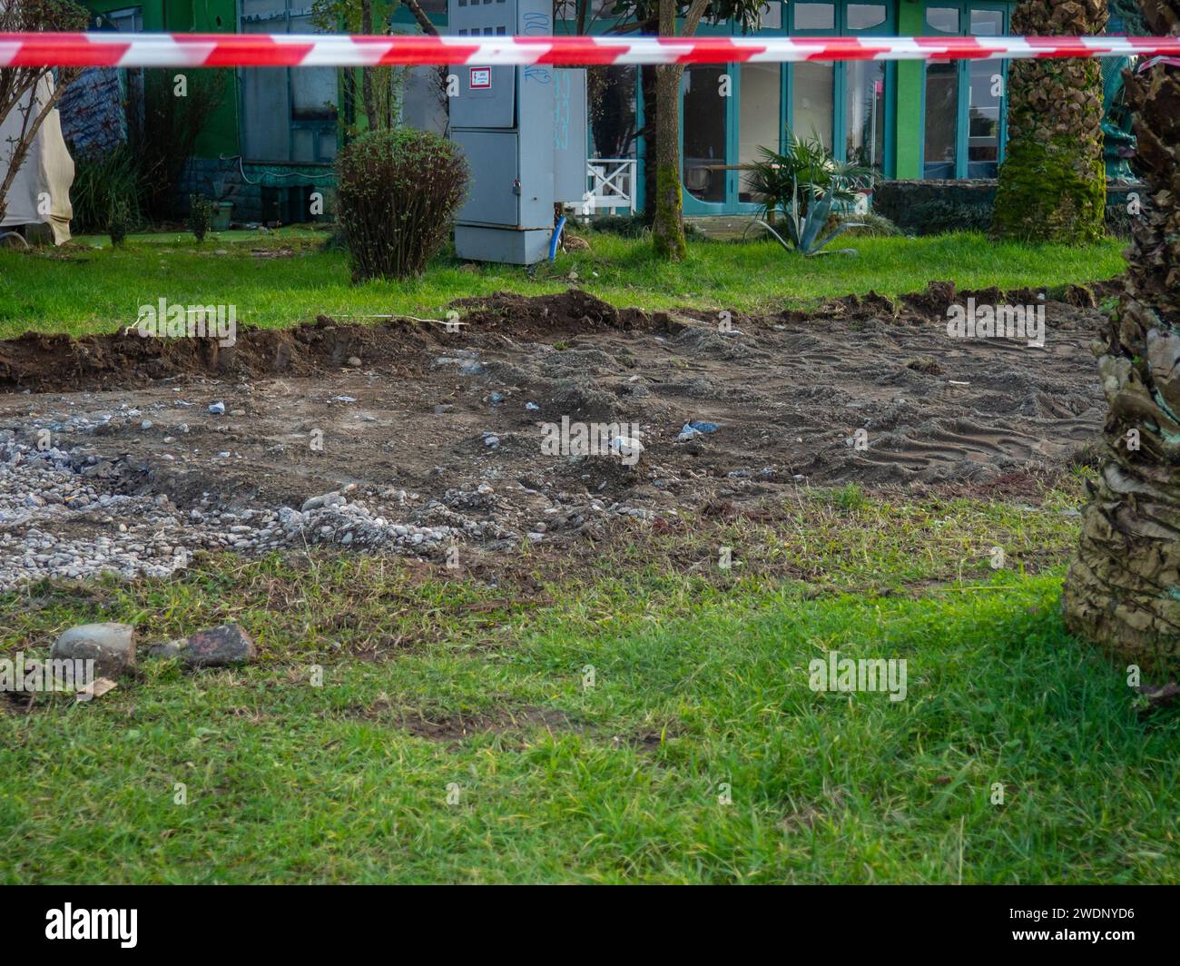 Reconstruction of the bike path. Replacing tiles on a bike path among ...