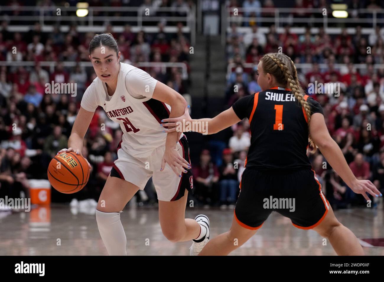 Stanford forward Brooke Demetre, left, moves the ball past Oregon State guard Kennedie Shuler ...