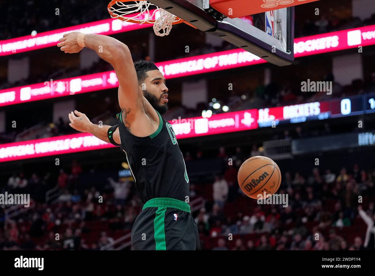 Boston Celtics' Jayson Tatum dunks the ball against the Houston Rockets ...