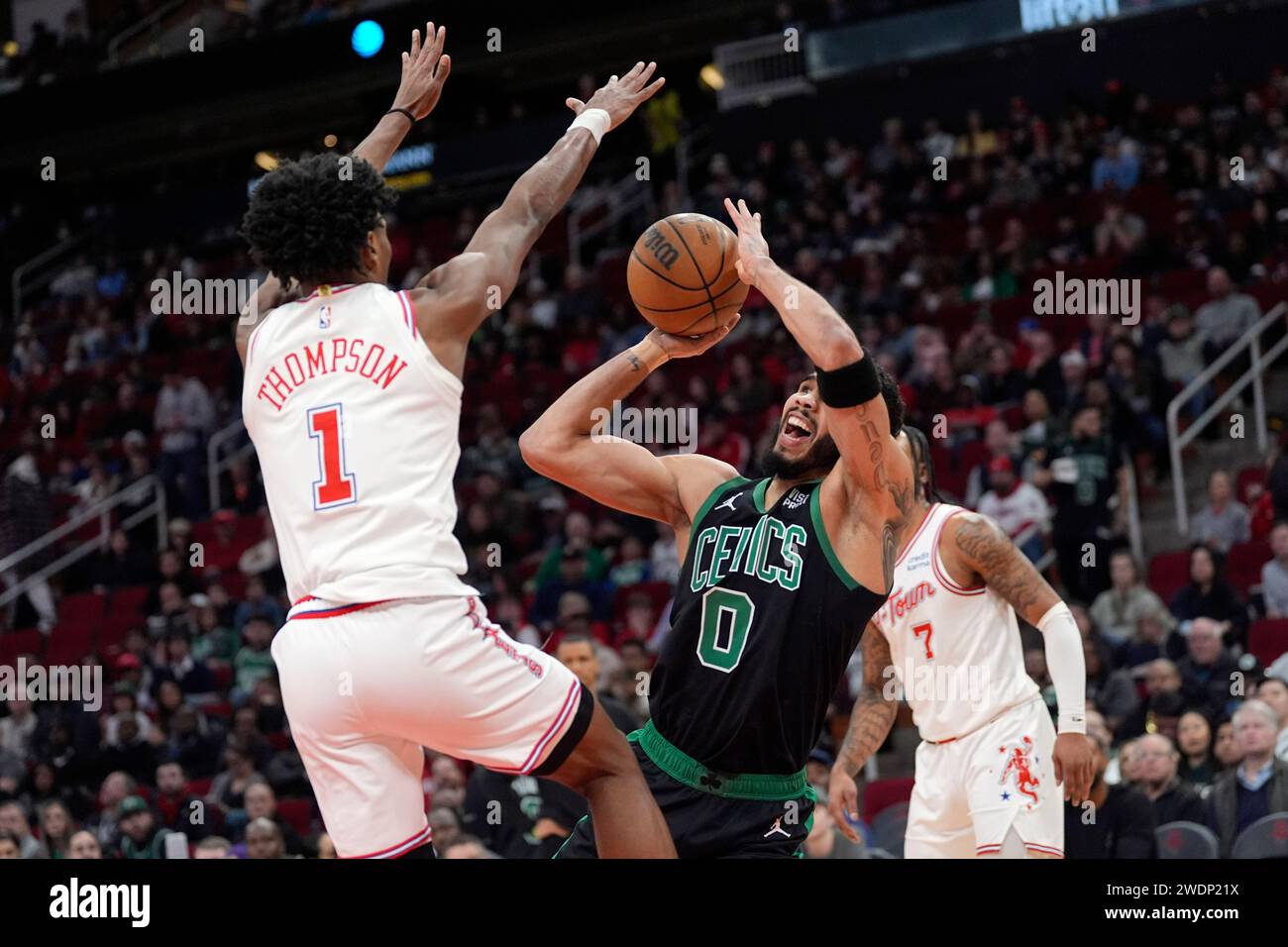 Boston Celtics' Jayson Tatum (0) shoots as Houston Rockets' Amen ...