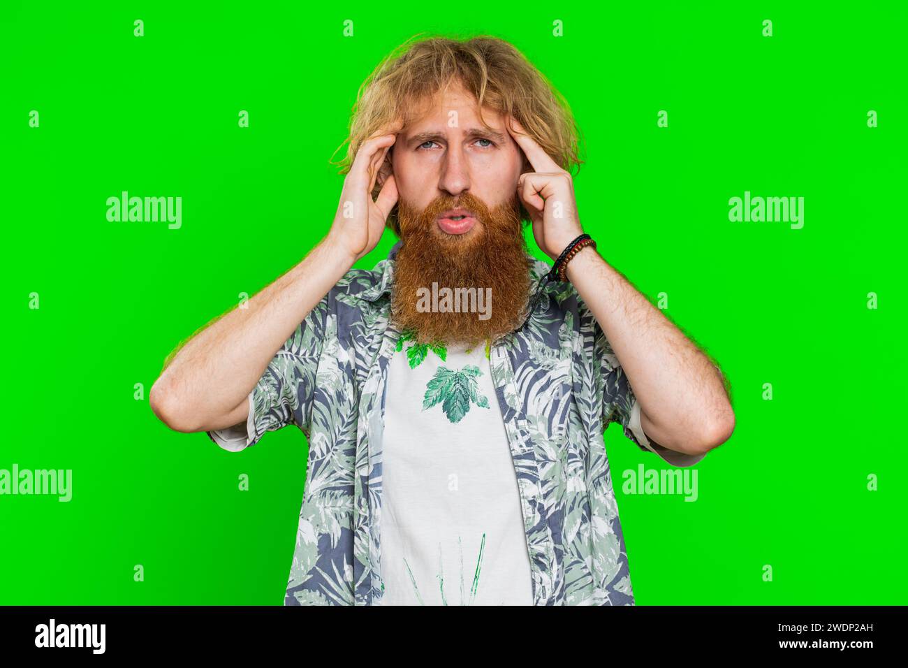 Displeased exhausted young man guy rubbing temples to cure headache ...