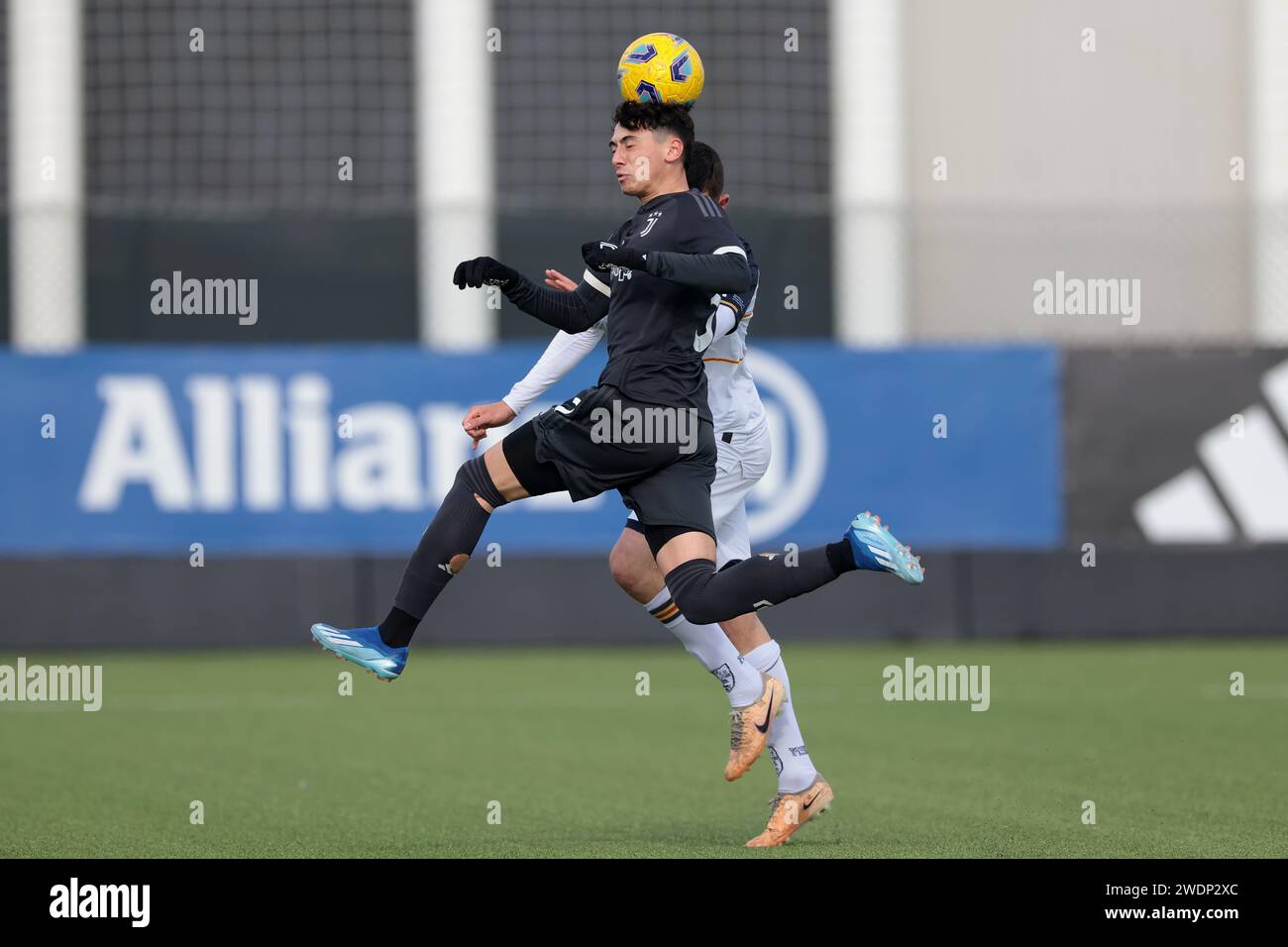 Vinovo, Italy. 21st Jan, 2024. Diego Pugno of Juventus heads on from ...