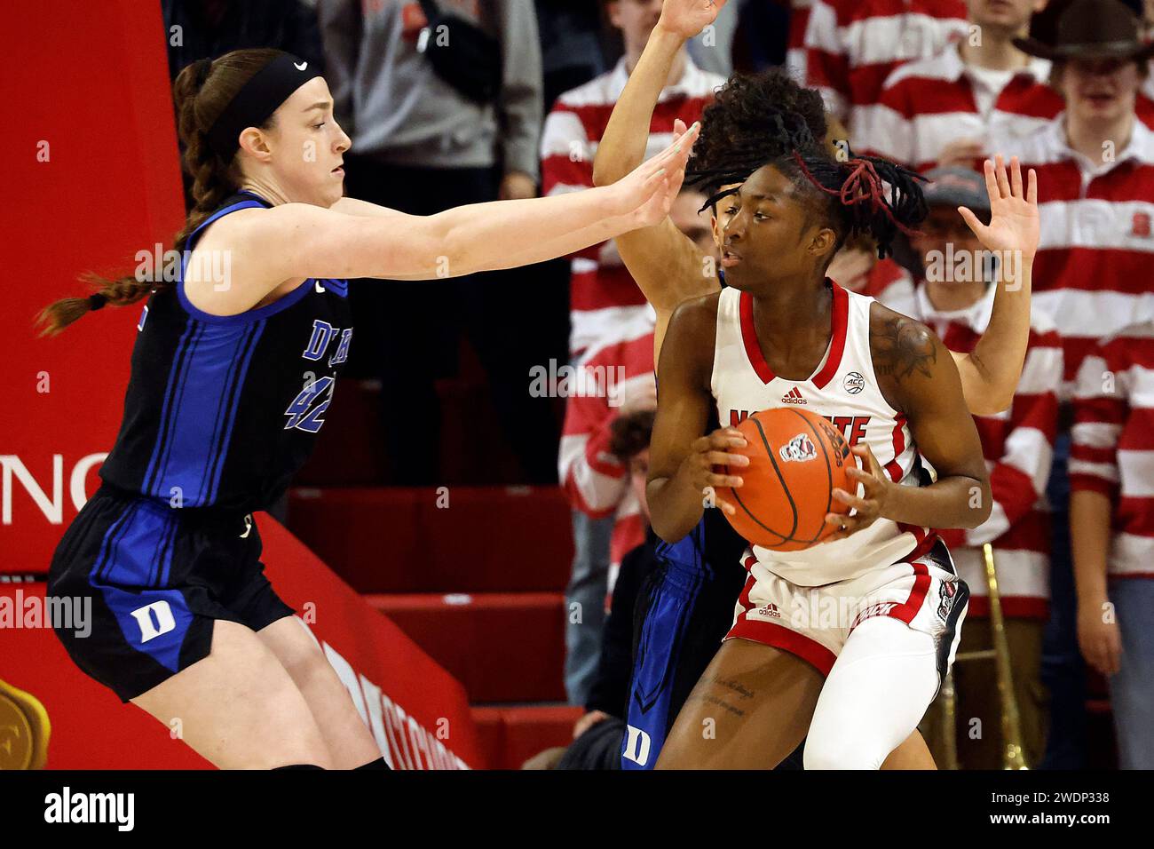 North Carolina State's Saniya Rivers (22) tries to pass the ball around ...